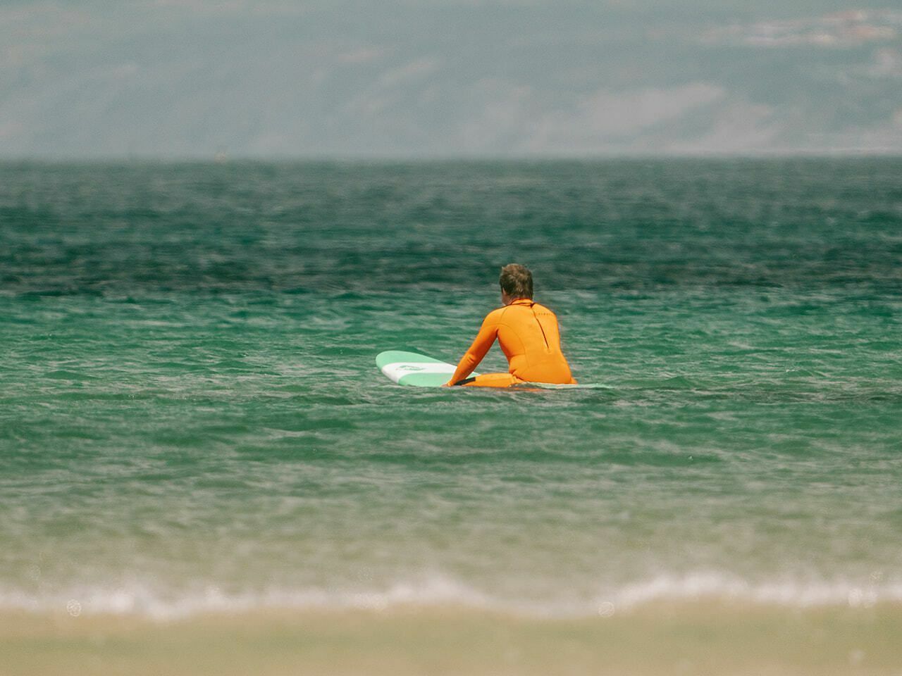 21 Surfing Tips and Tricks for Beginners: Learn How to Surf with Our Guide!